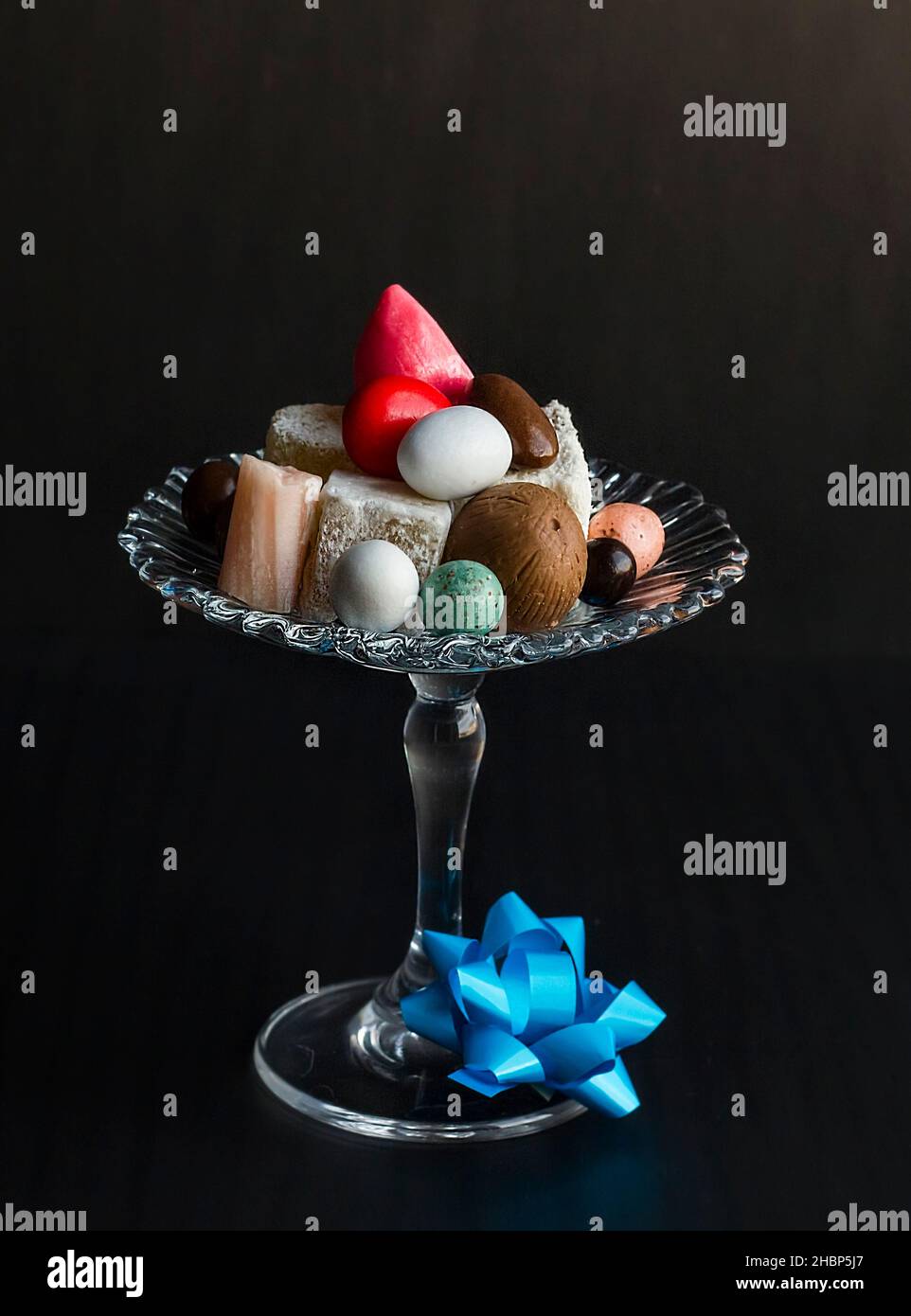 Traditional Colorful Turkish Candies in glass candy bowl with blue ...