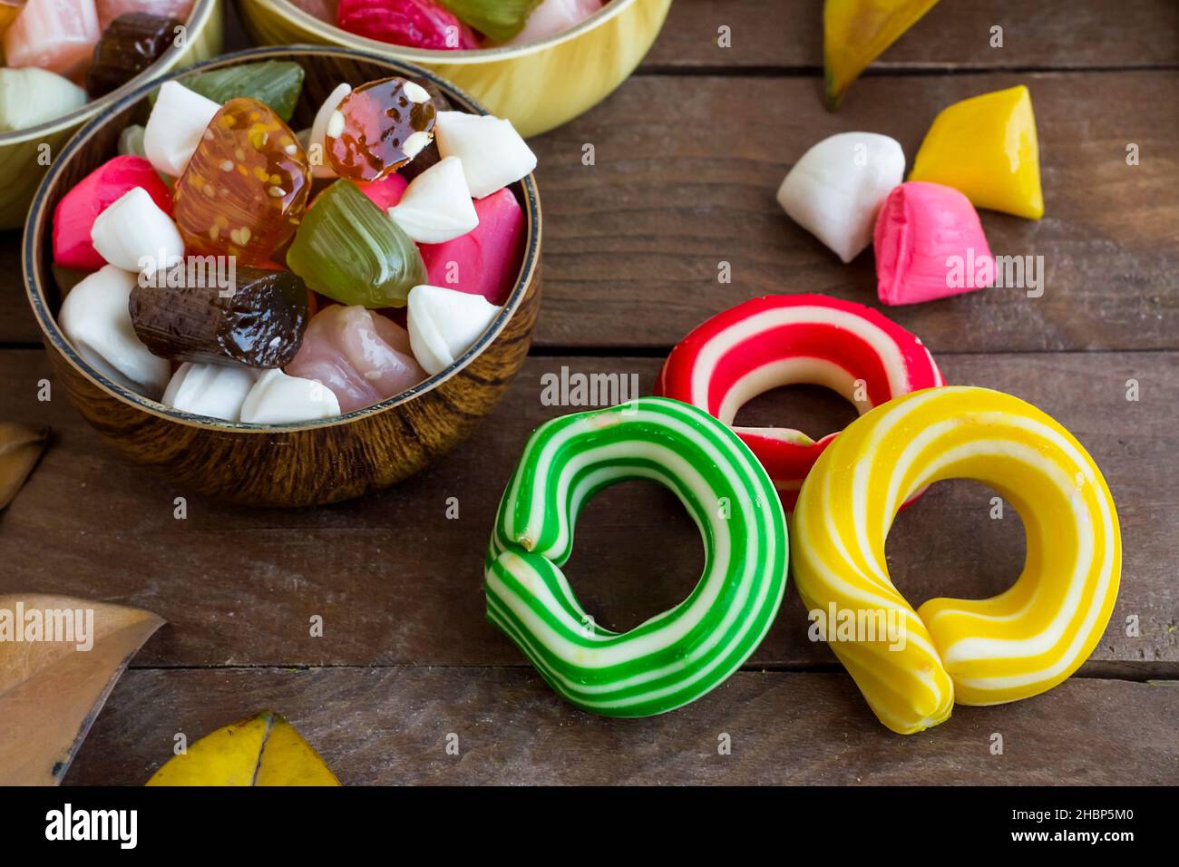 Traditional Turkish hard candy Akide in bamboo bowl,on wooden table ...