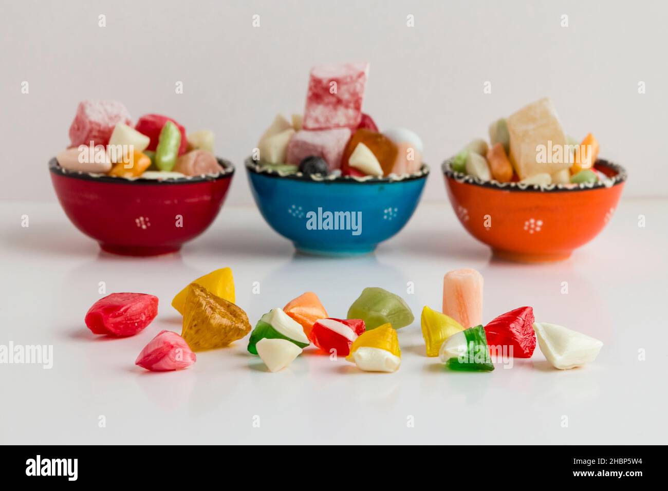 Traditional Turkish hard candy Akide on the line in front of colorful ...
