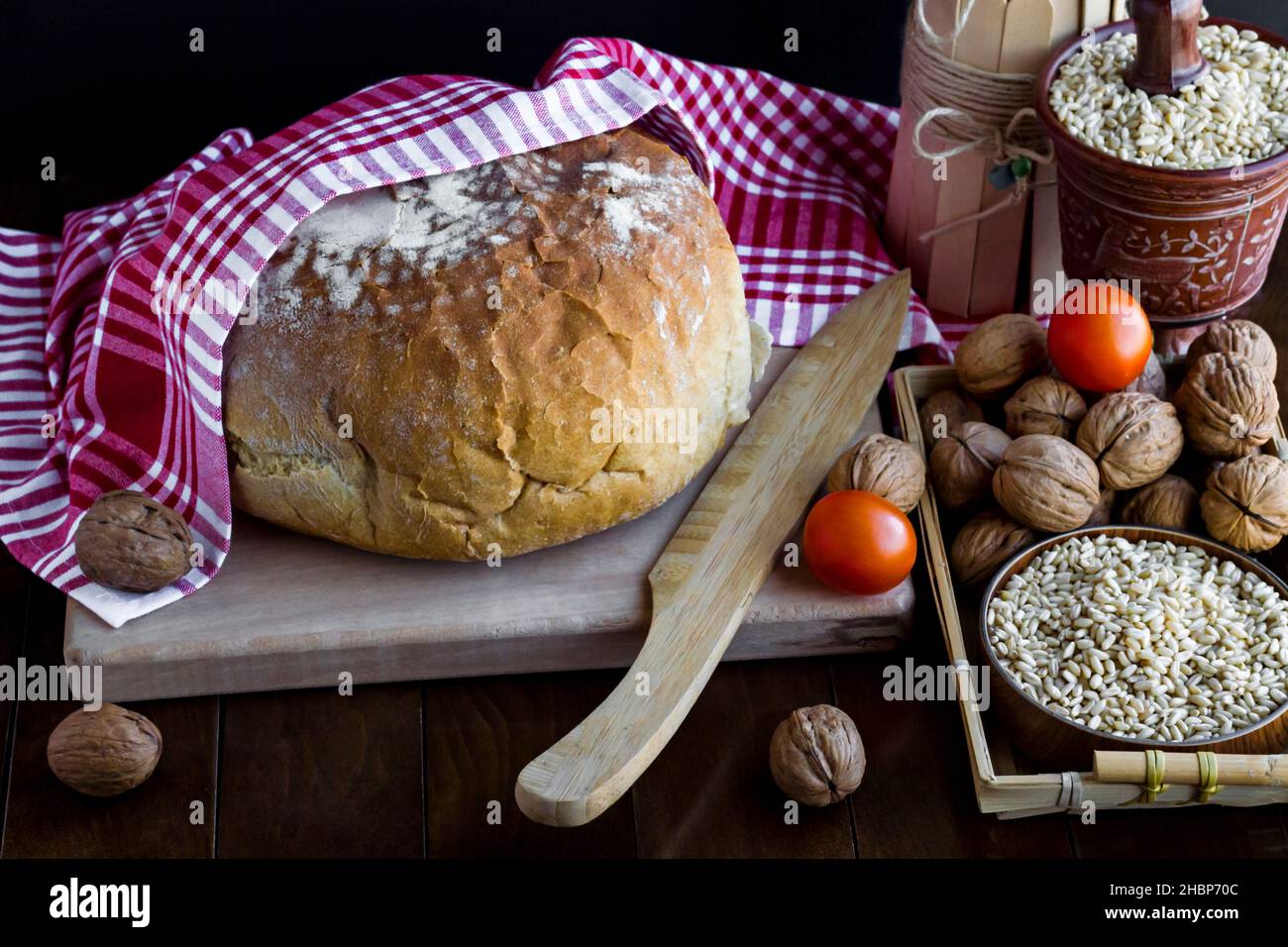 Fresh,Sourdough German Round Bread on the wooden table with red color ...