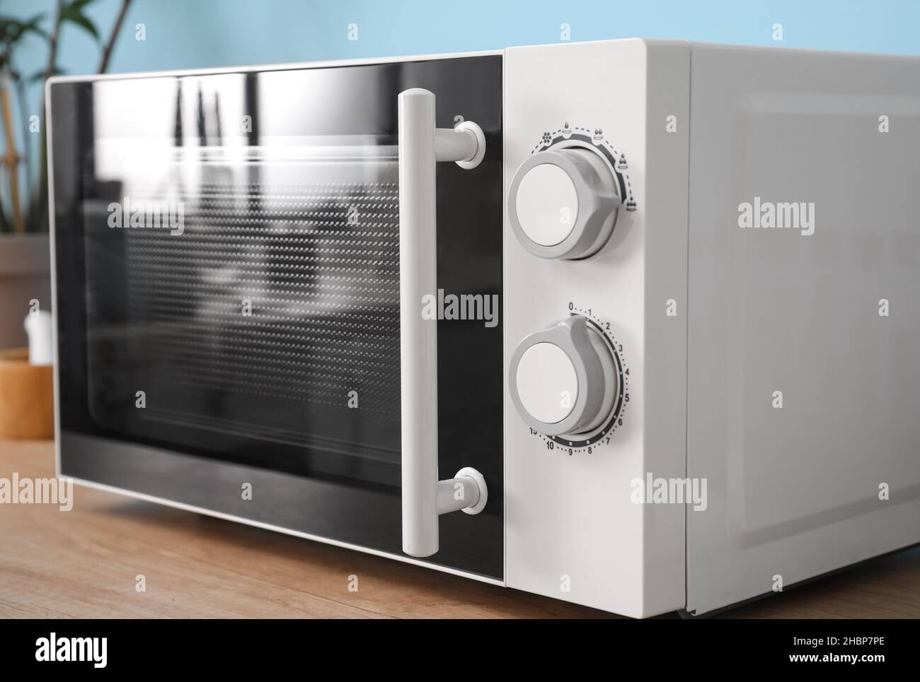 Modern microwave oven in kitchen, closeup Stock Photo - Alamy