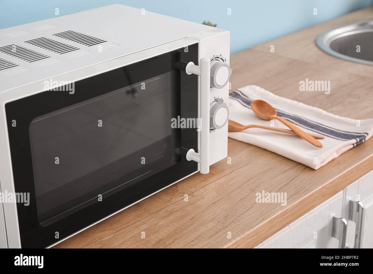 Modern microwave oven in kitchen Stock Photo - Alamy