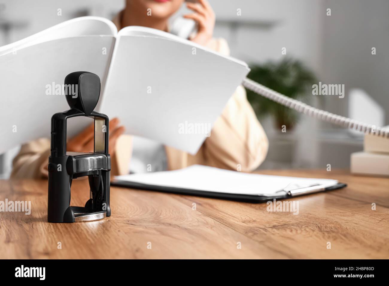 Stamp on table of notary public in office Stock Photo - Alamy