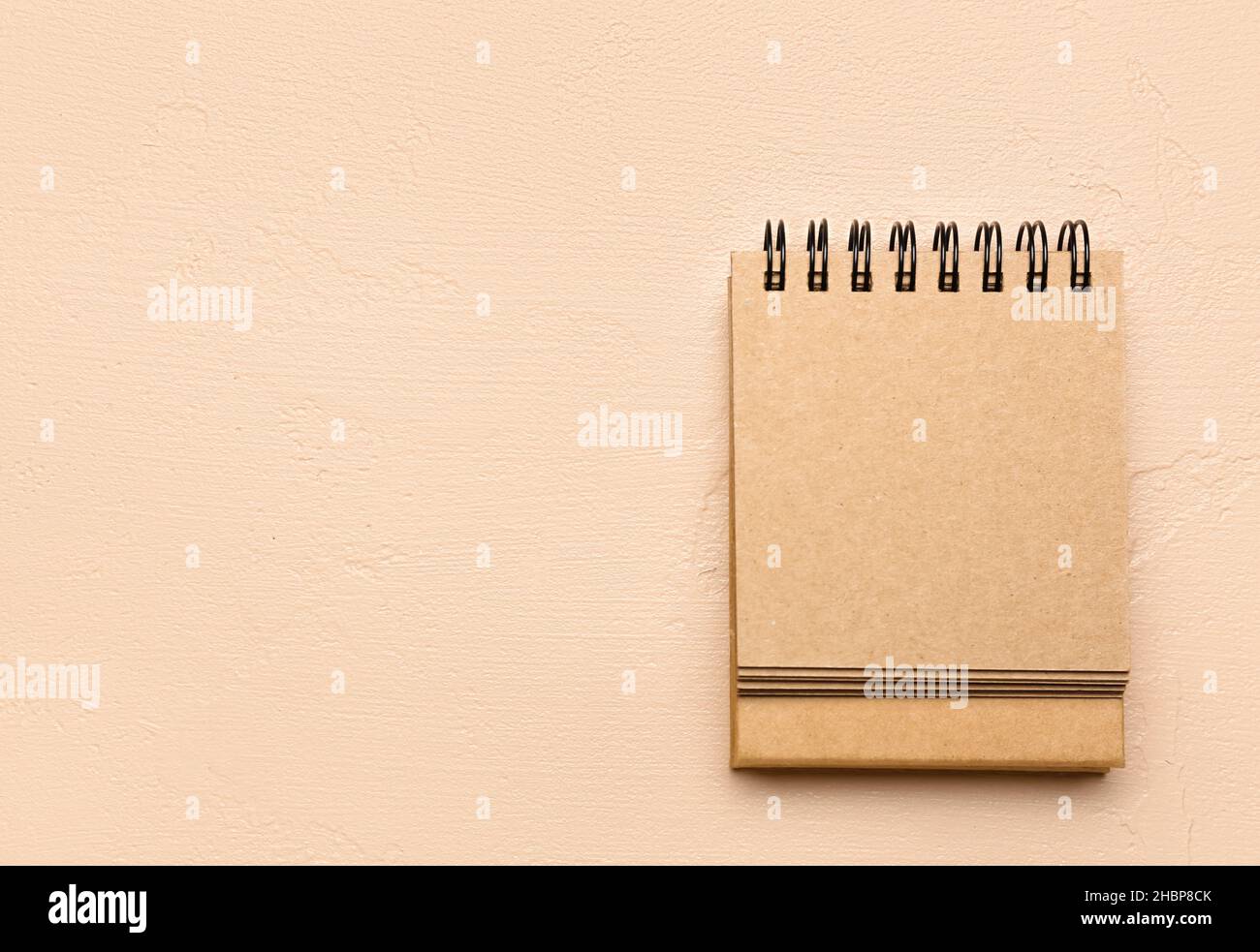 Blank craft calendar on color background Stock Photo - Alamy
