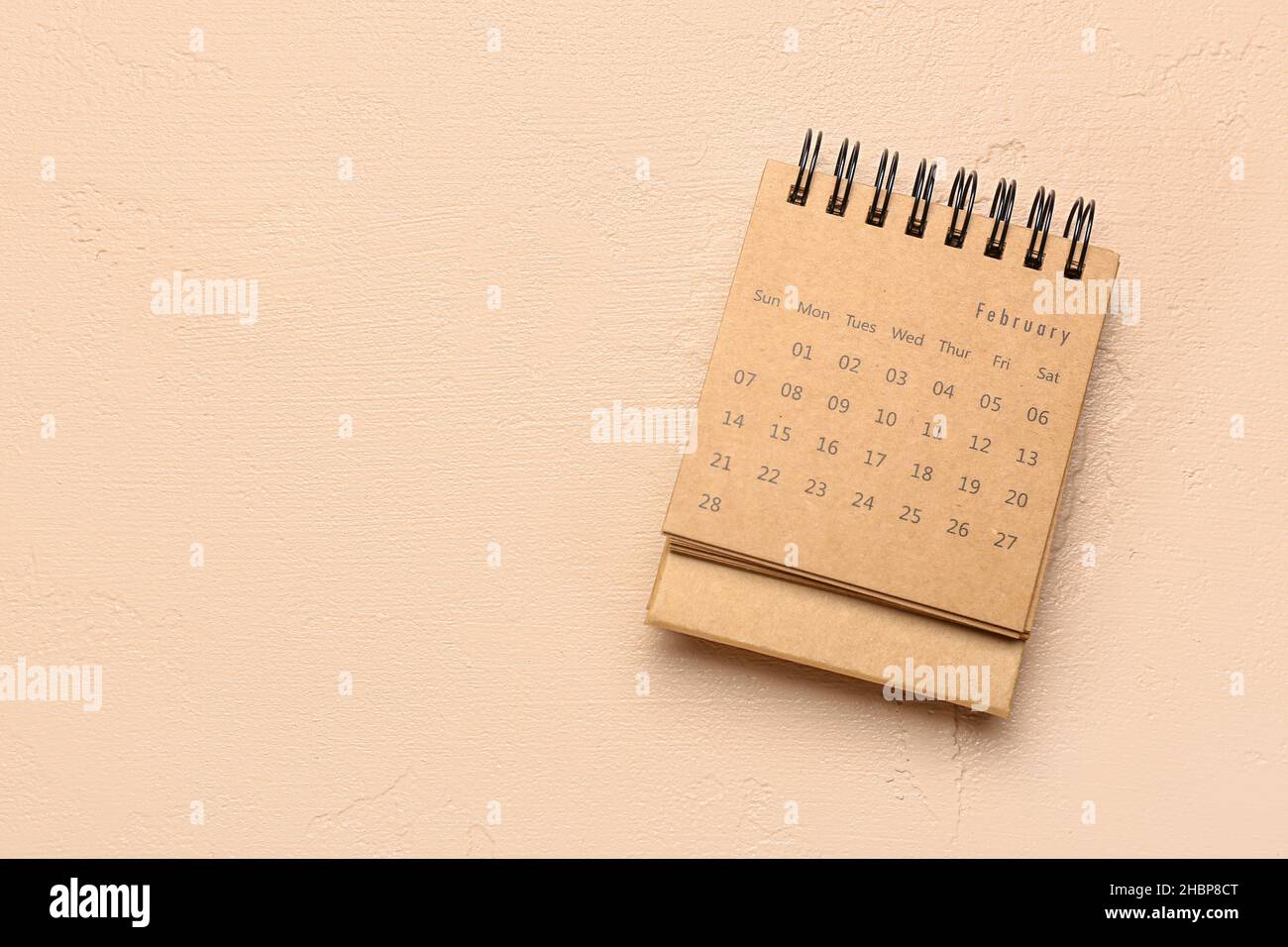 Craft calendar on beige background Stock Photo - Alamy