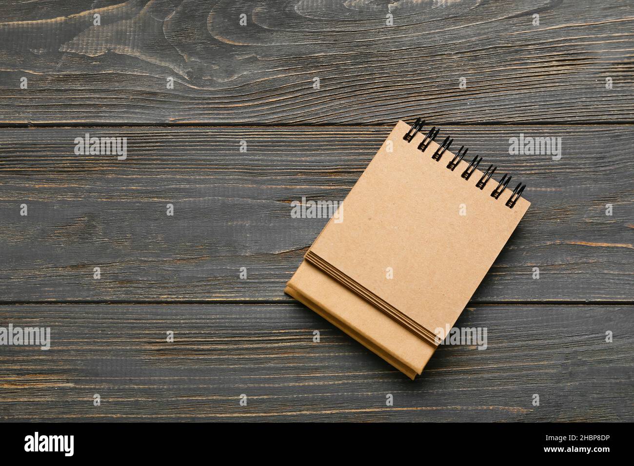 Blank craft calendar on dark wooden background Stock Photo - Alamy