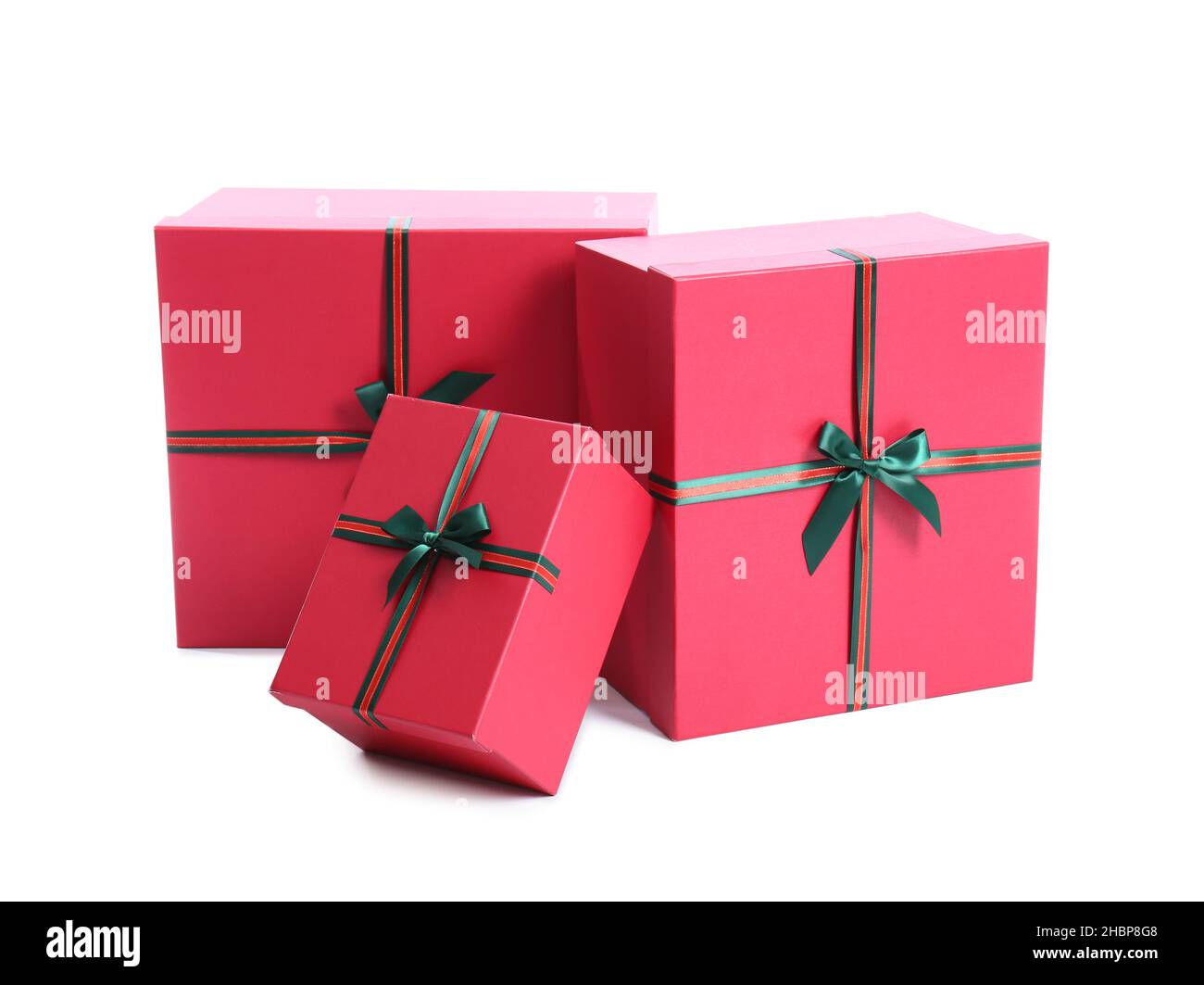 Red Christmas gift boxes isolated on white background Stock Photo - Alamy