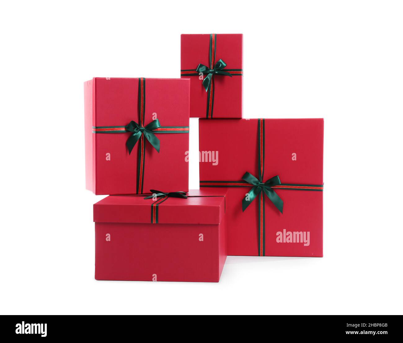 Red Christmas gift boxes on white background Stock Photo - Alamy