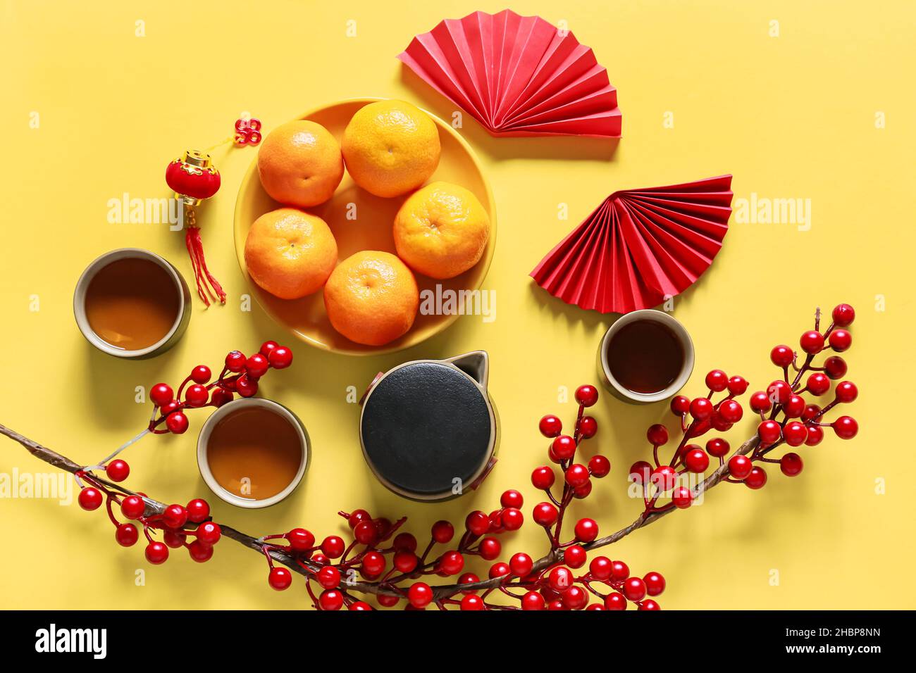 Traditional tea with Chinese symbols on yellow background Stock Photo ...