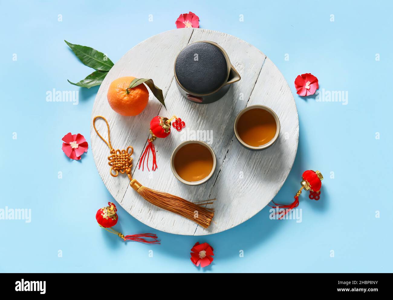 Traditional tea with Chinese symbols on blue background Stock Photo - Alamy