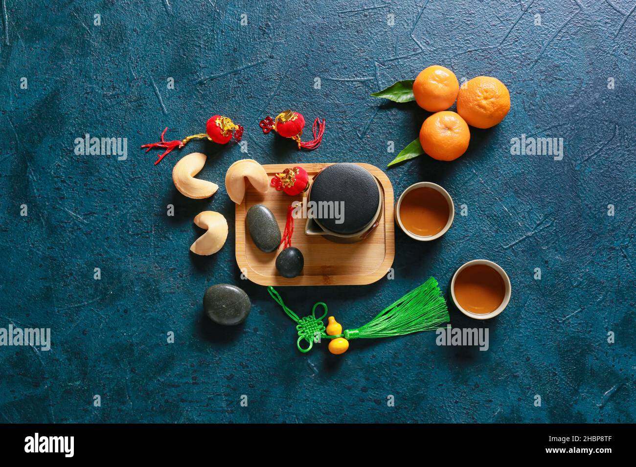 Traditional tea with Chinese symbols on dark background Stock Photo - Alamy