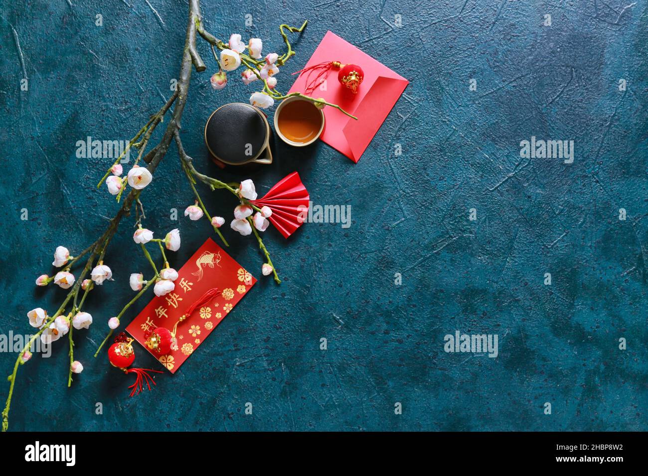 Red envelopes with Chinese symbols on dark background. New Year ...