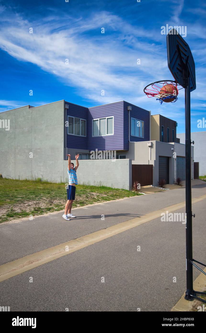 Athletic man shooting basketball making hi-res stock photography and ...