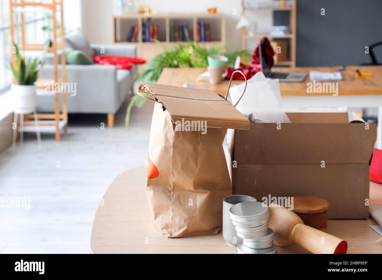 Different stuff on table in room after party Stock Photo - Alamy