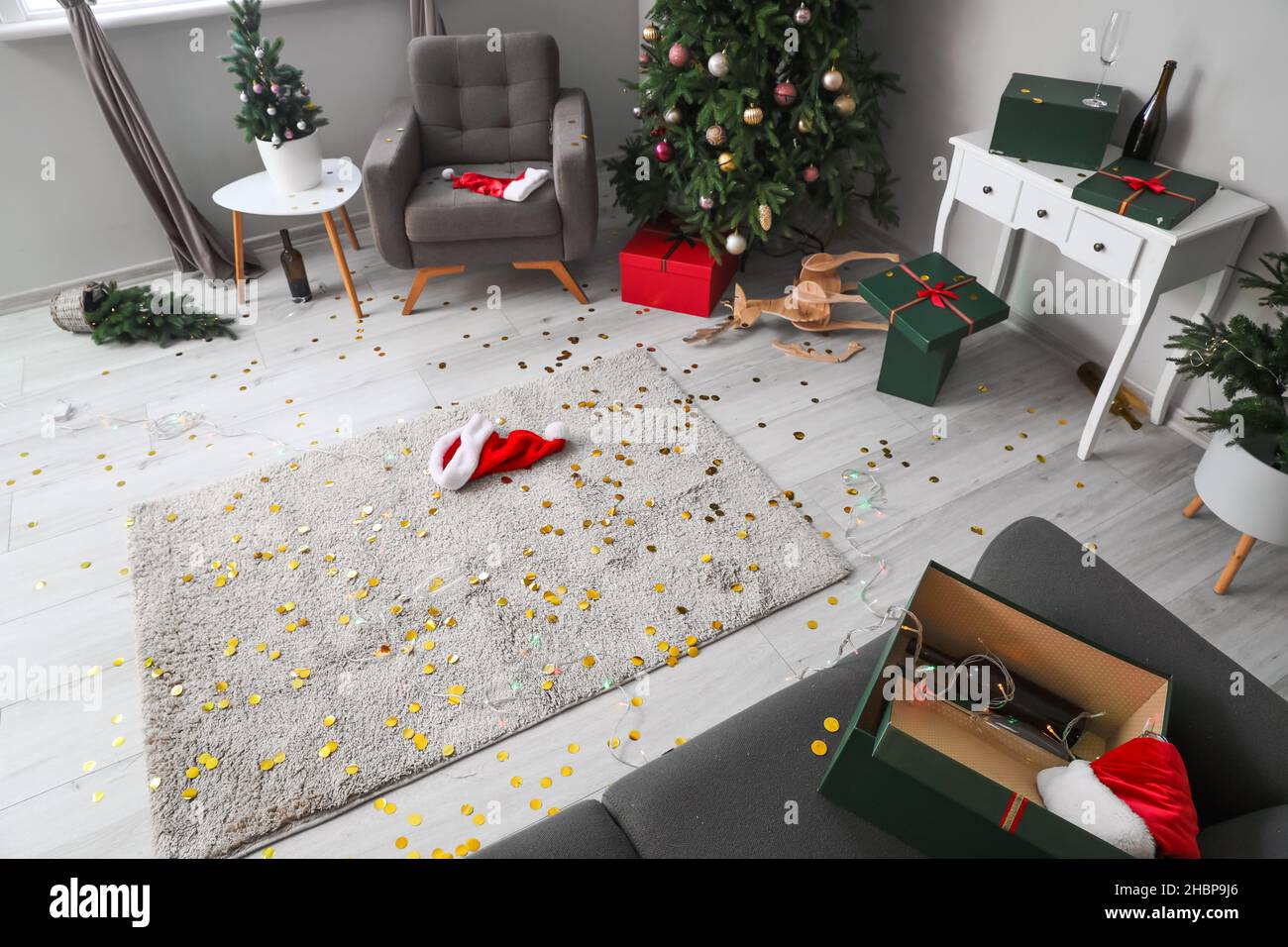 Interior of messy room after Christmas celebration Stock Photo - Alamy
