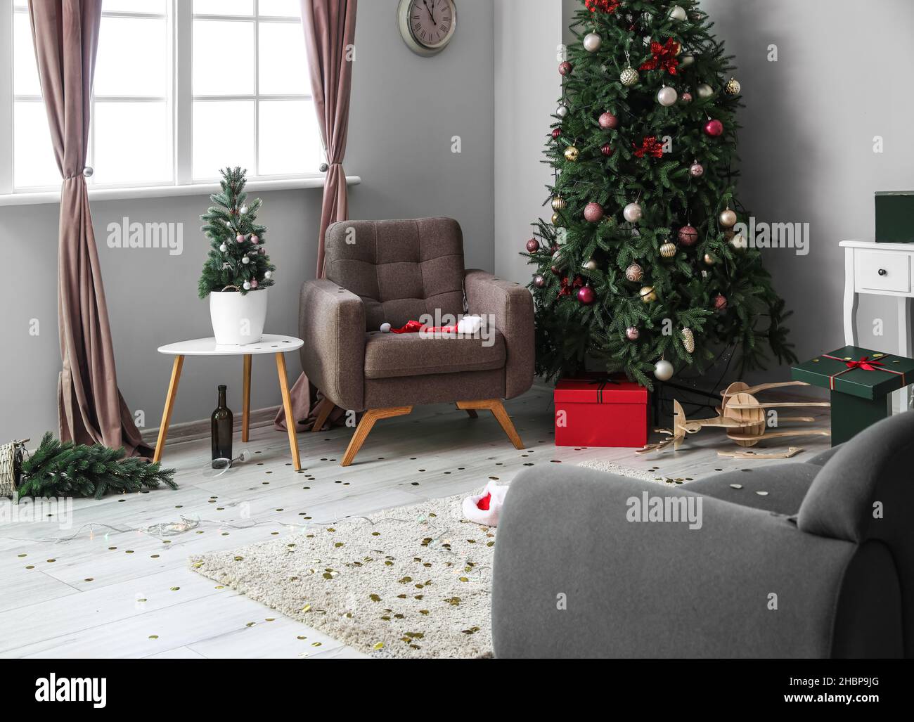 Interior of messy room after Christmas celebration Stock Photo - Alamy