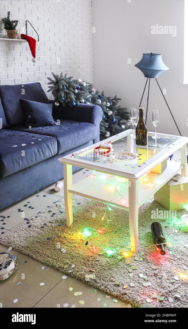 Interior of messy room after Christmas celebration Stock Photo - Alamy