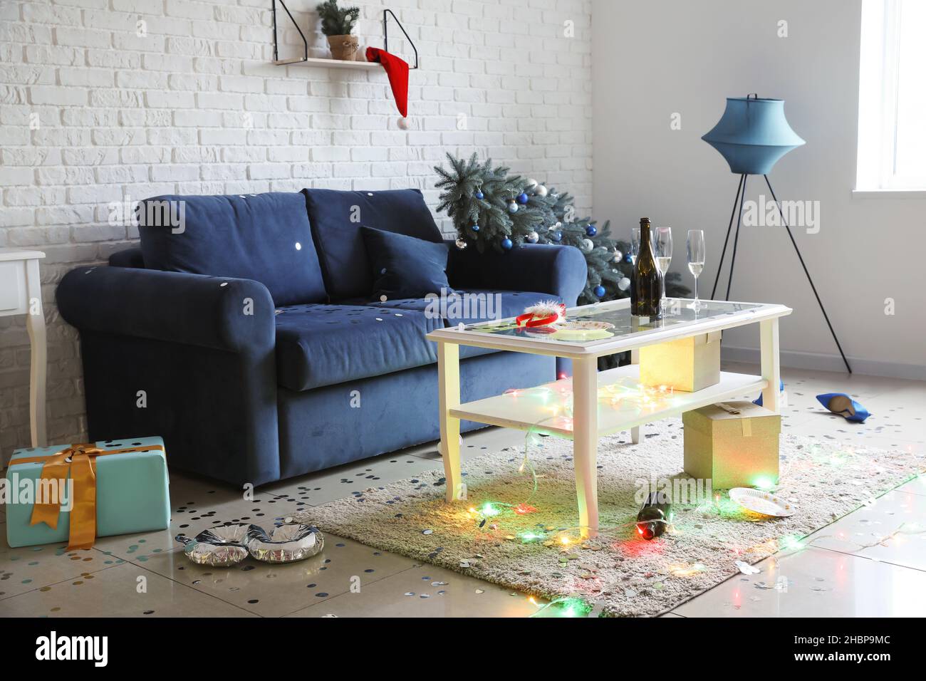 Interior of messy room after Christmas celebration Stock Photo - Alamy