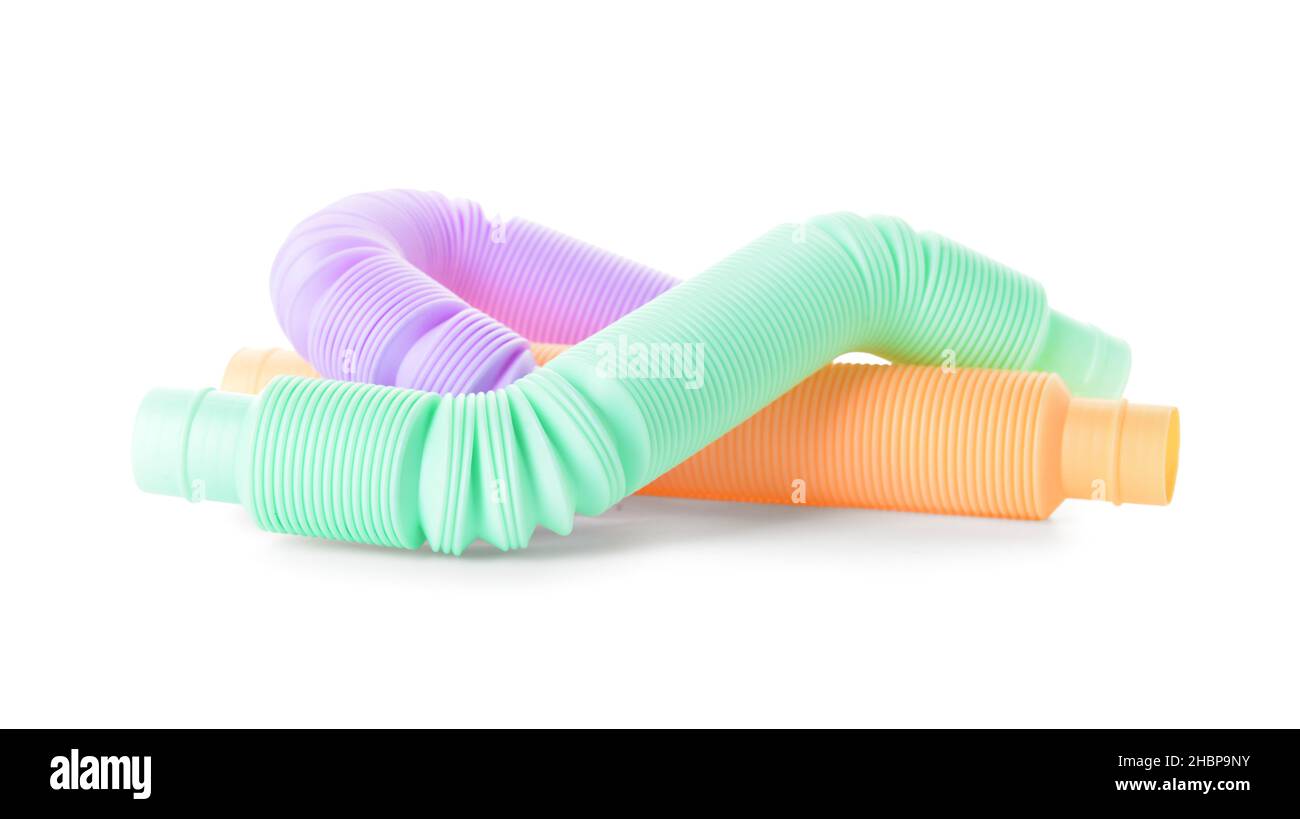 Different Pop Tubes on white background Stock Photo - Alamy