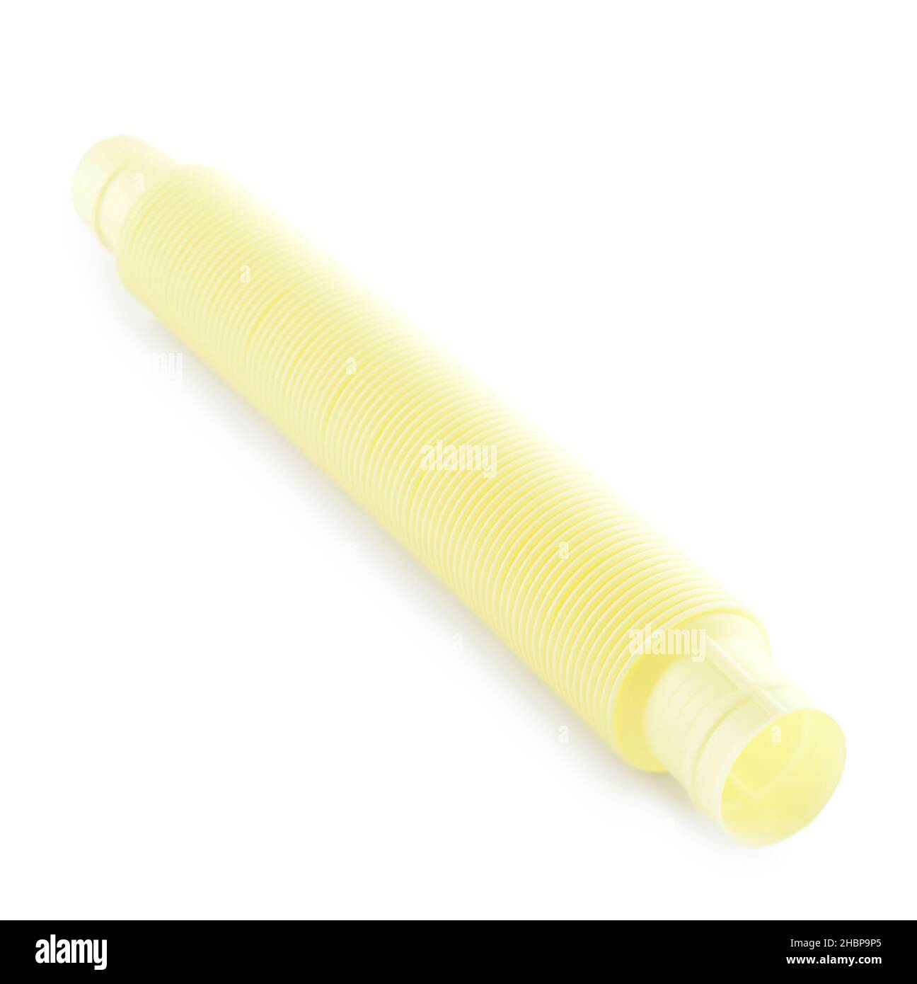 Yellow Pop Tube on white background Stock Photo - Alamy