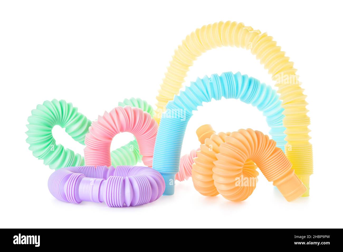 Different colorful Pop Tubes on white background Stock Photo - Alamy