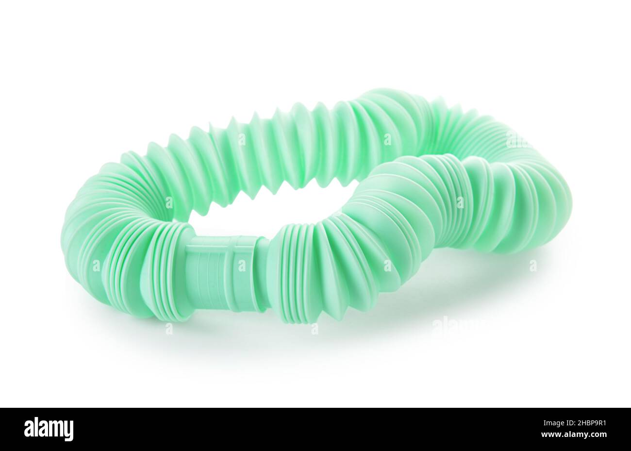 Green Pop Tube on white background Stock Photo - Alamy