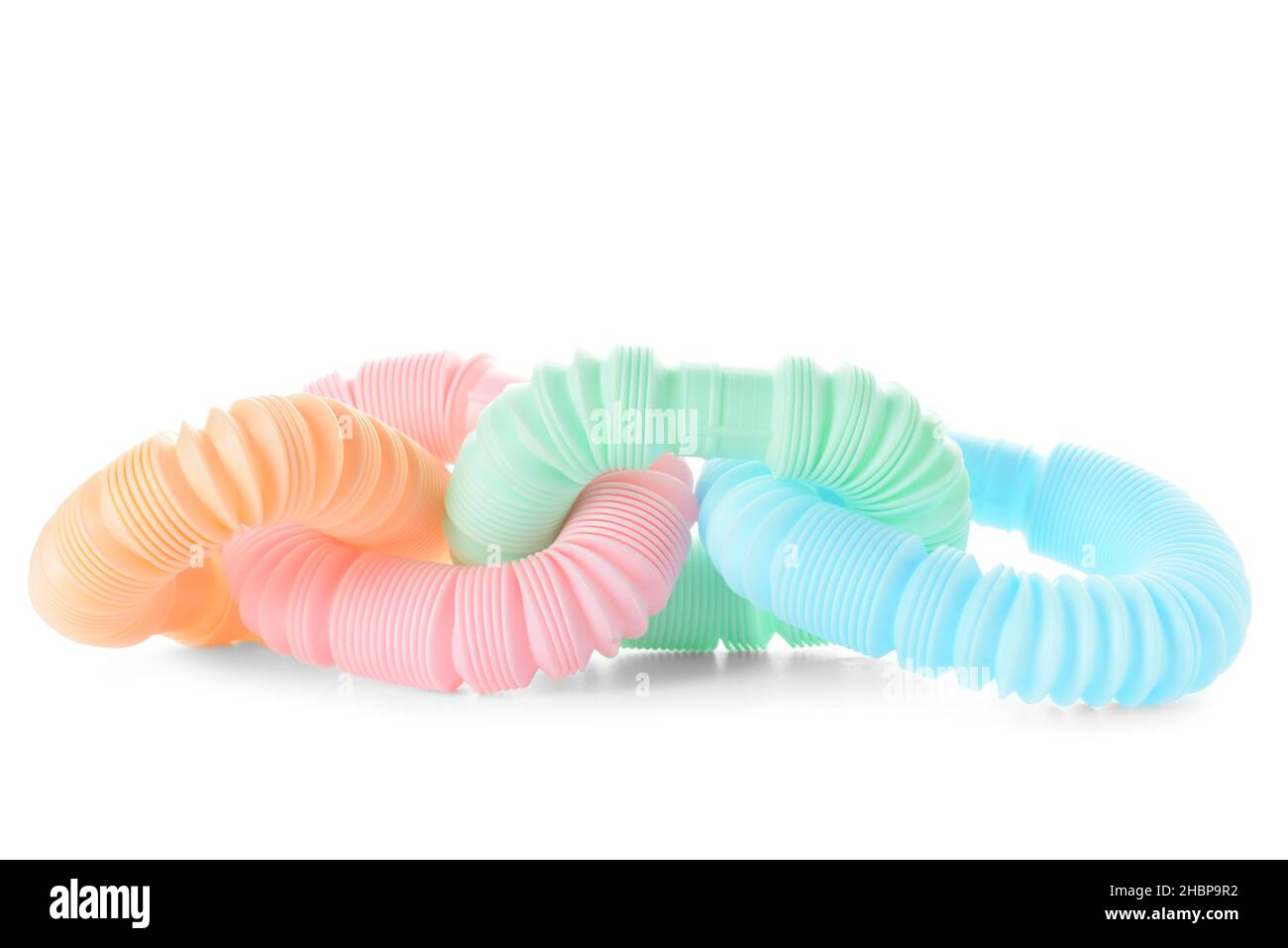 Different Pop Tubes on white background Stock Photo - Alamy
