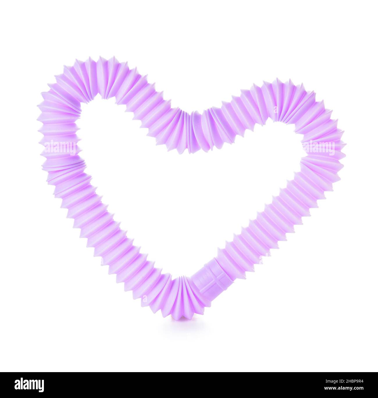 Heart made of purple Pop Tube on white background Stock Photo - Alamy