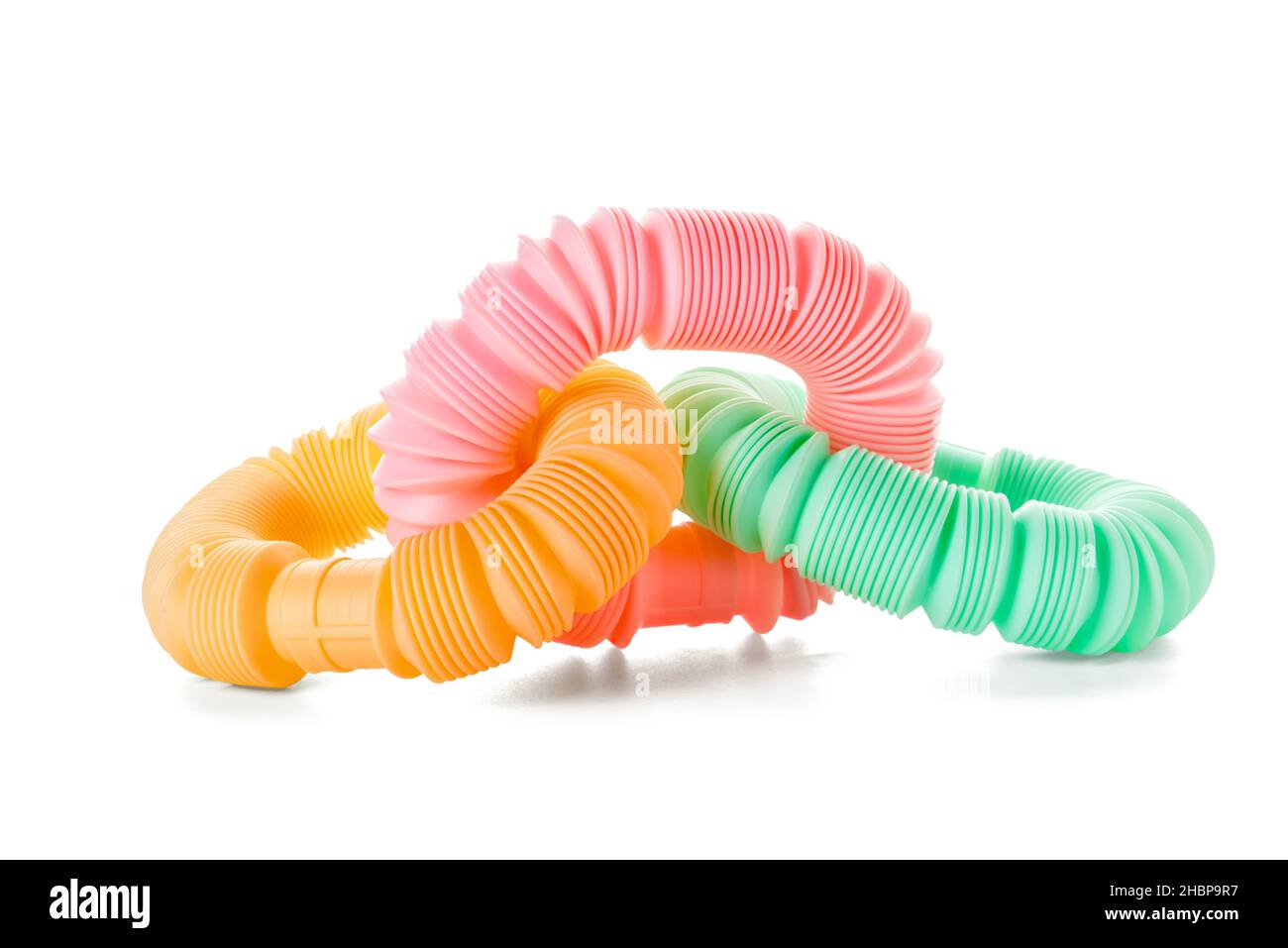 Different Pop Tubes on white background Stock Photo - Alamy