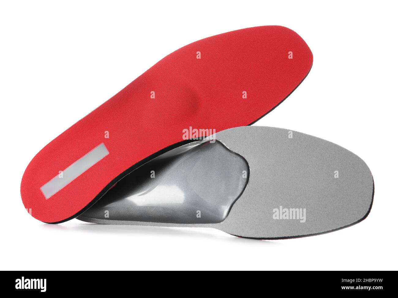 Red orthopedic insoles on white background Stock Photo - Alamy