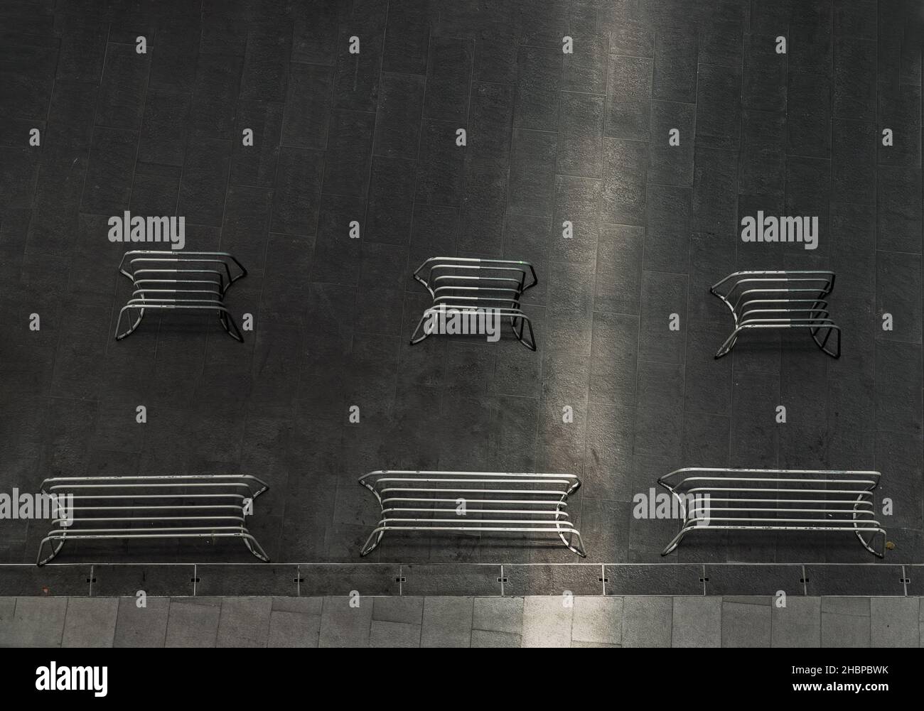 Perspective outdoor white metal benchs in open empty space area of the ...