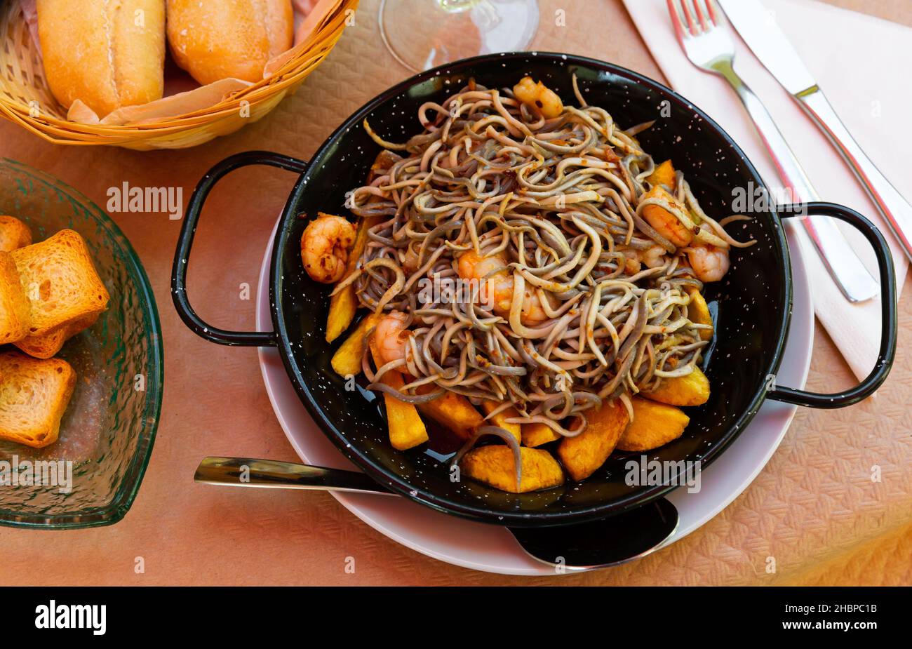 Surimi elvers with prawns and potato Stock Photo - Alamy