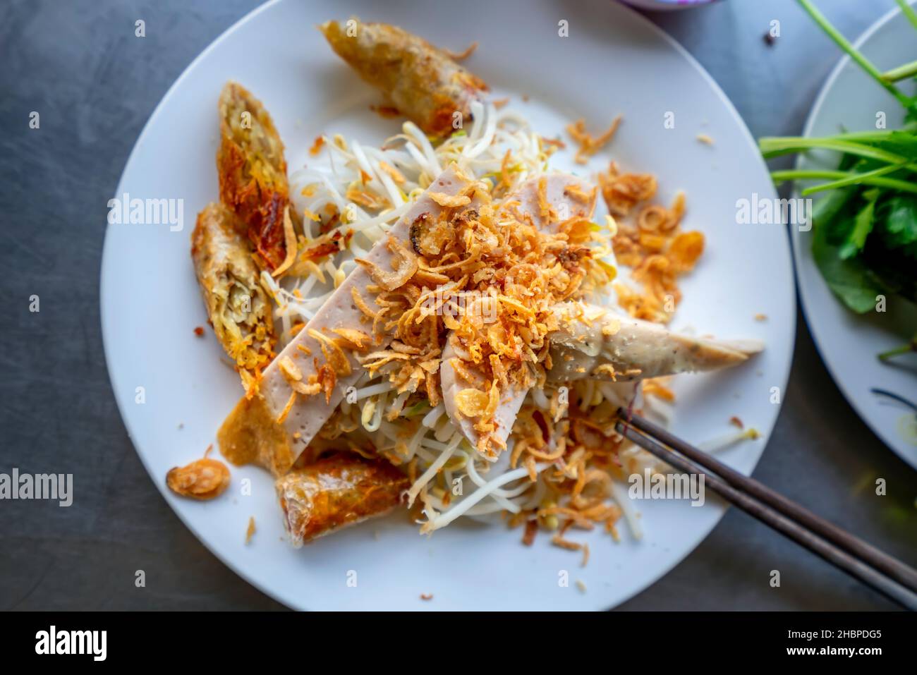 Steamed rolled rice pancake Vietnamese food with herbs and fish sauce ...