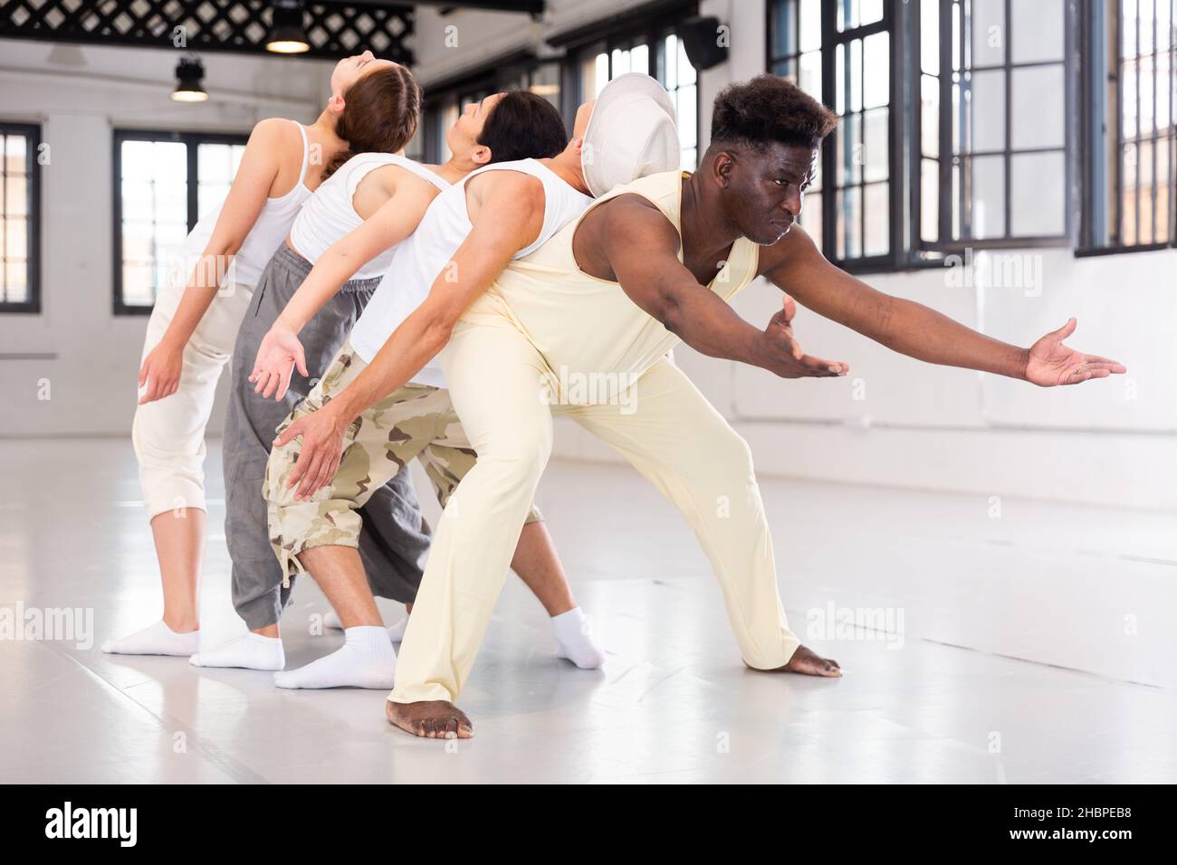 Dancers perform theatrical dance in classroom Stock Photo - Alamy