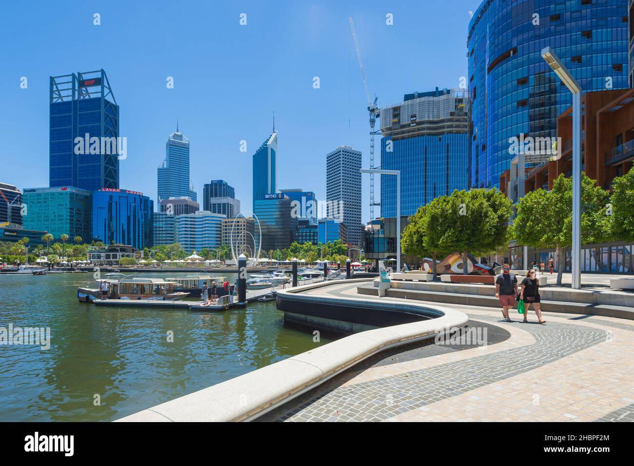 Couple walking on the foreshore at Elizabeth Quay, Perth, Western ...