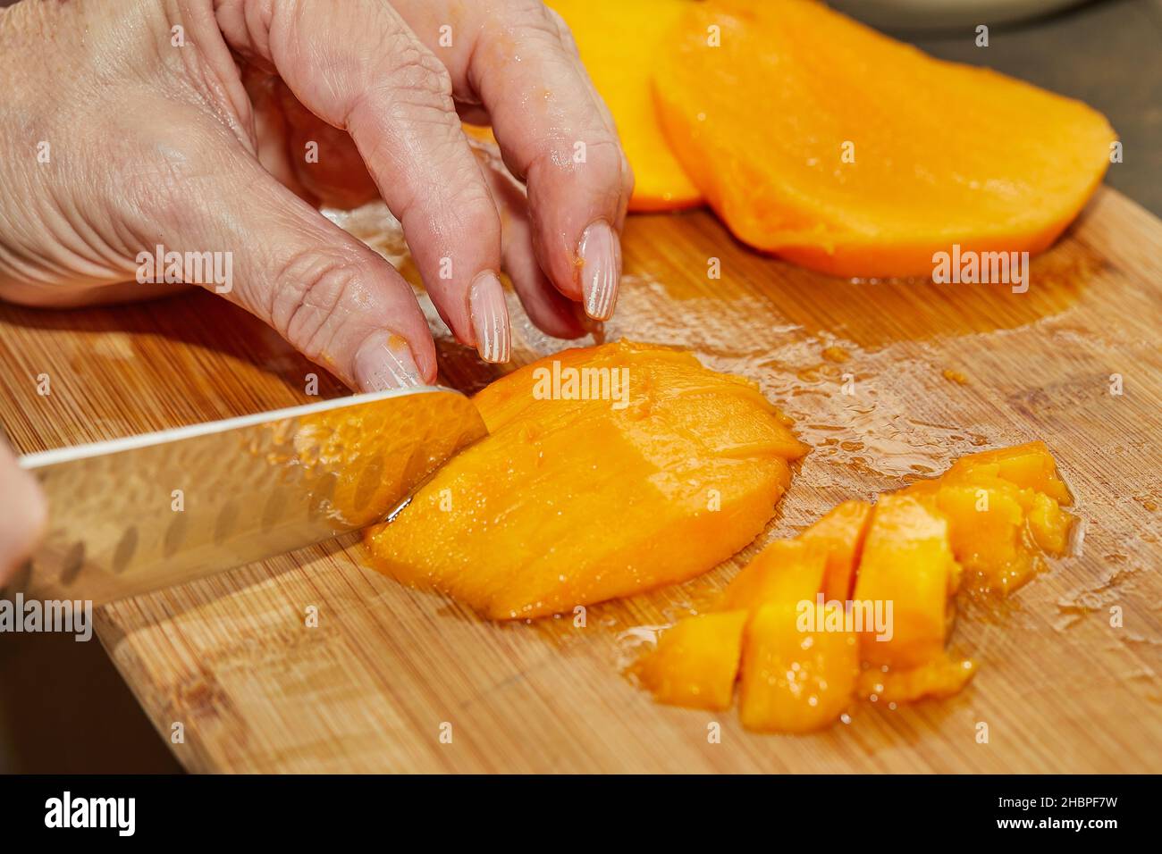 Juicy mango slices on hi-res stock photography and images - Alamy