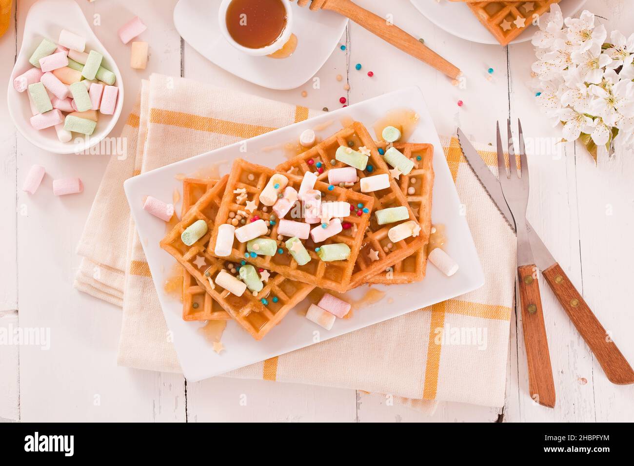 Waffles with colourful marshmallow Stock Photo - Alamy