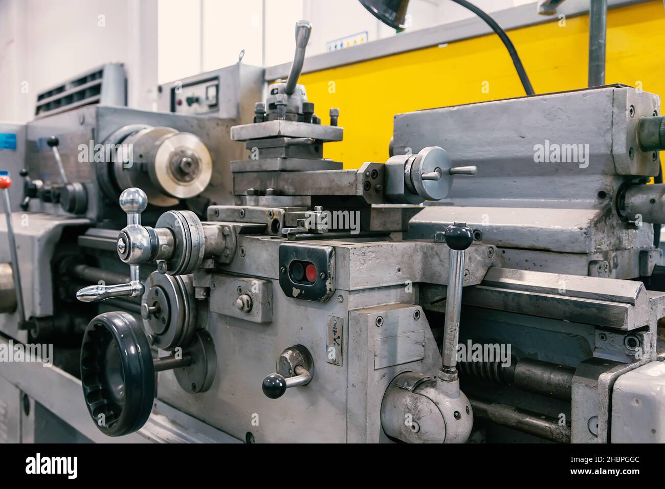 Part of lathe in workshop is close-up. Old lathe for metal processing ...