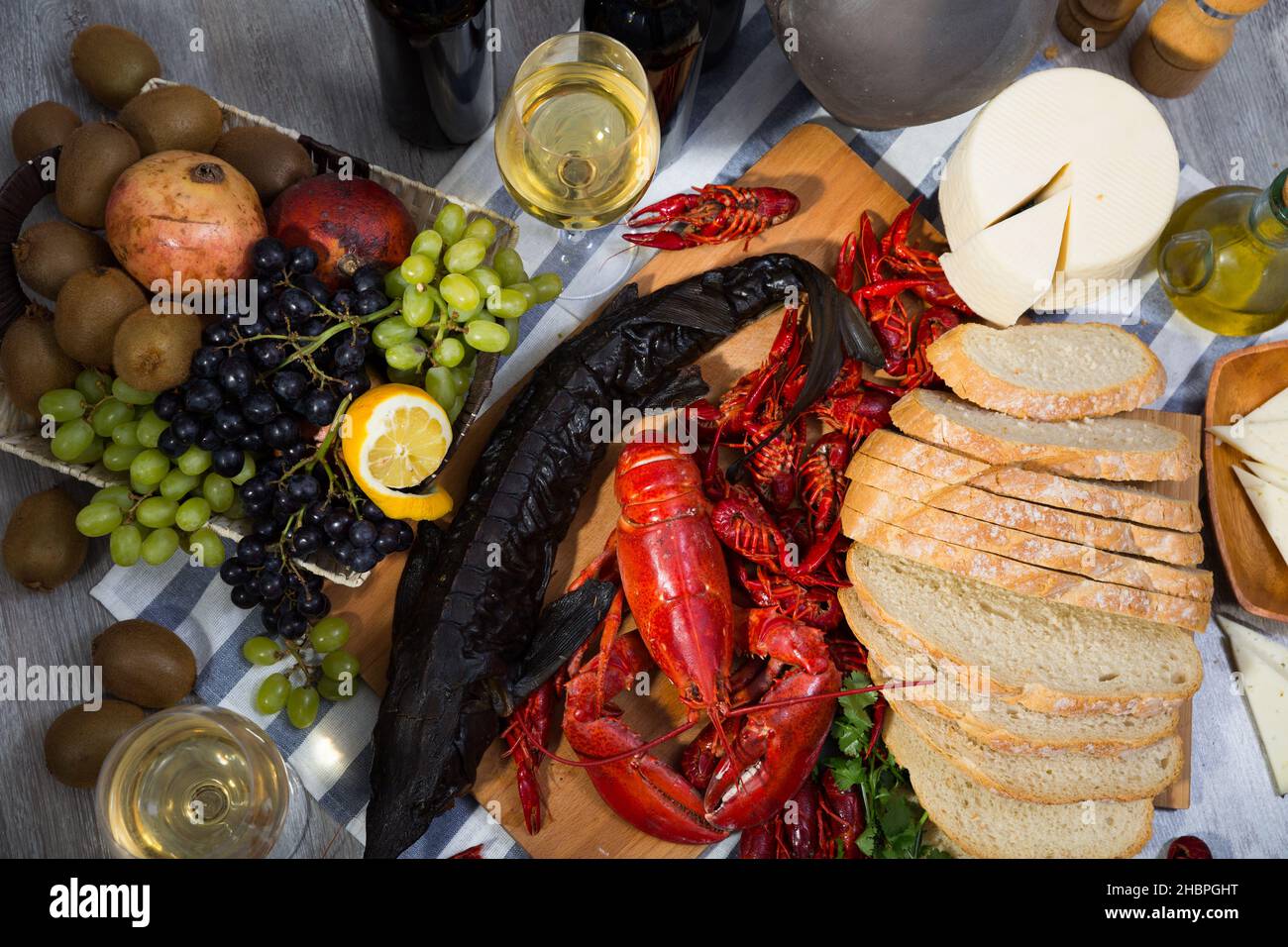 Smoked sturgeon, seafoods and white wine, top view Stock Photo - Alamy
