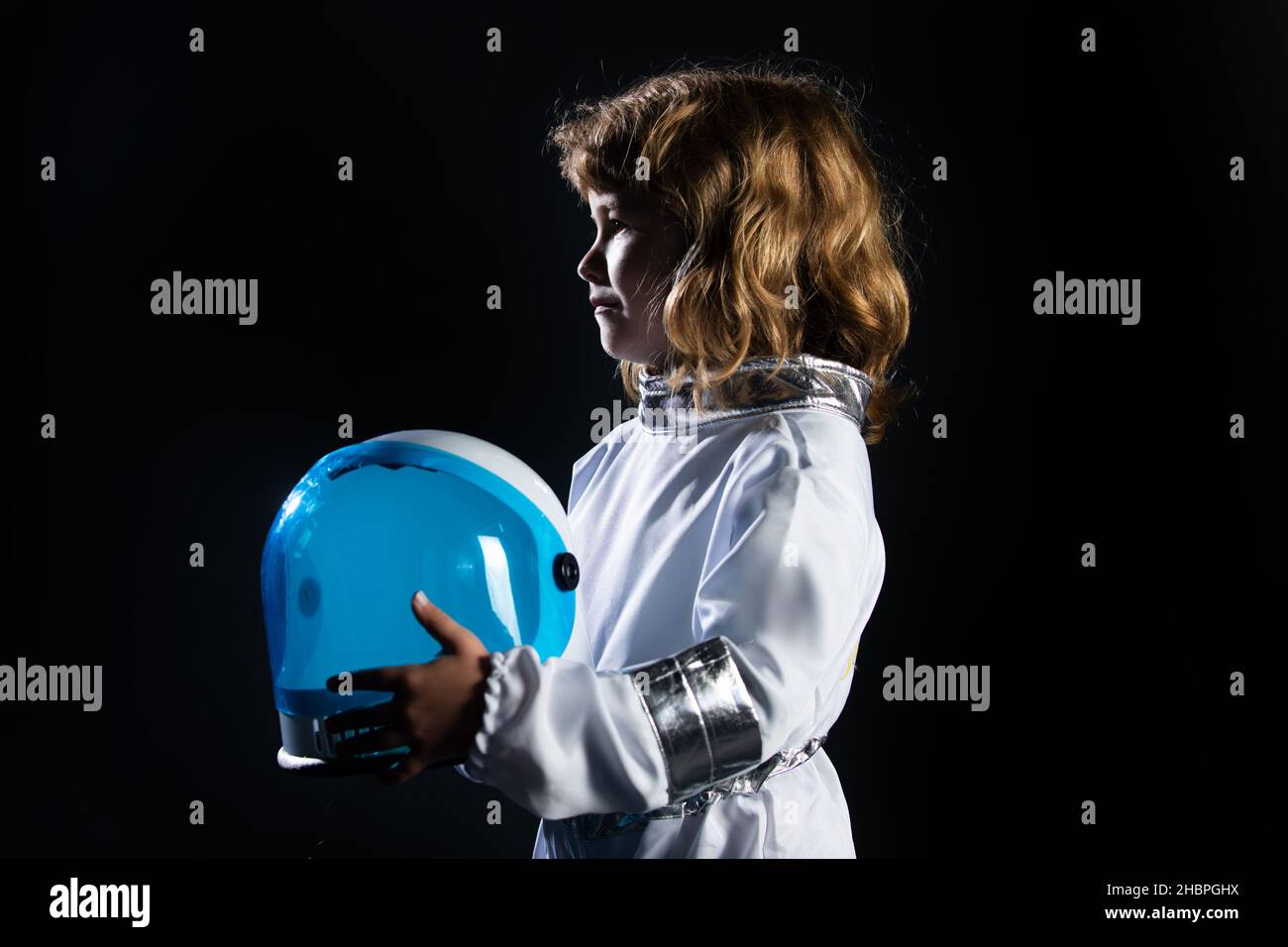 Little boy wearing an astronaut helmet costume and. Cute kid in ...
