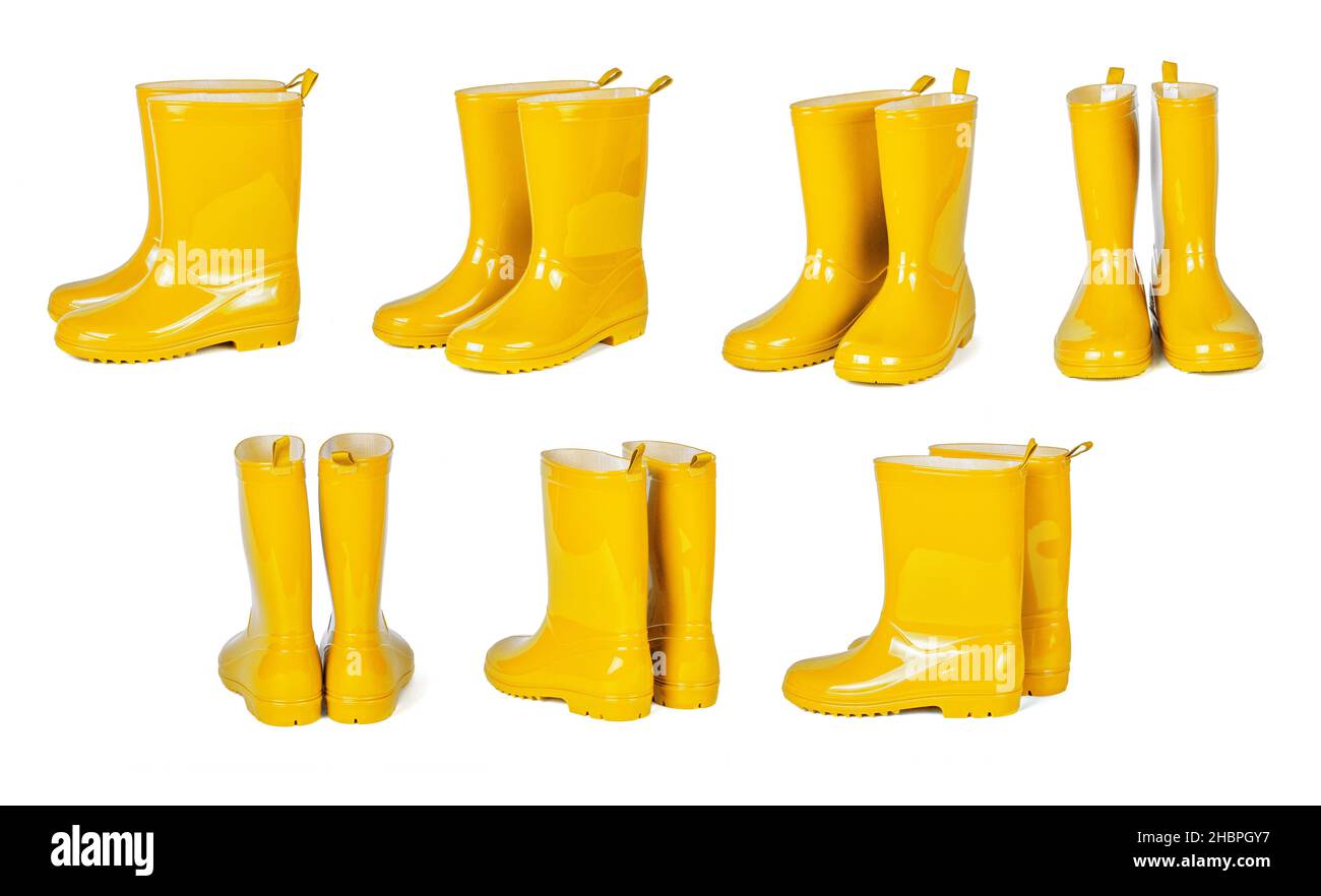 Set of yellow rubber boots isolated on white background Stock Photo - Alamy