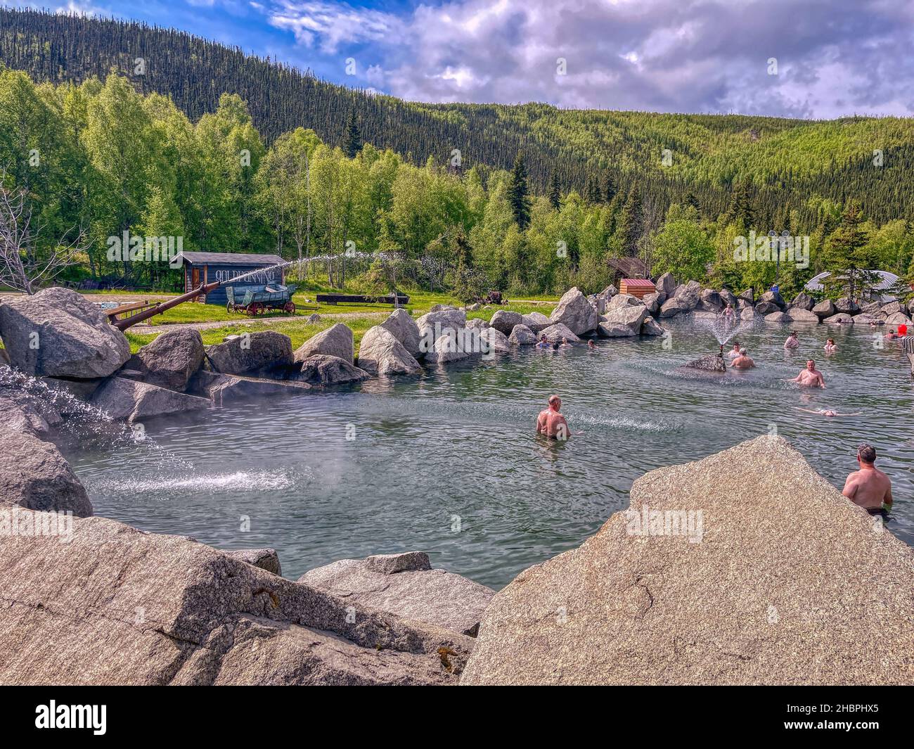 The view of people relaxing in the Chena Hot Springs in Alaska, USA ...