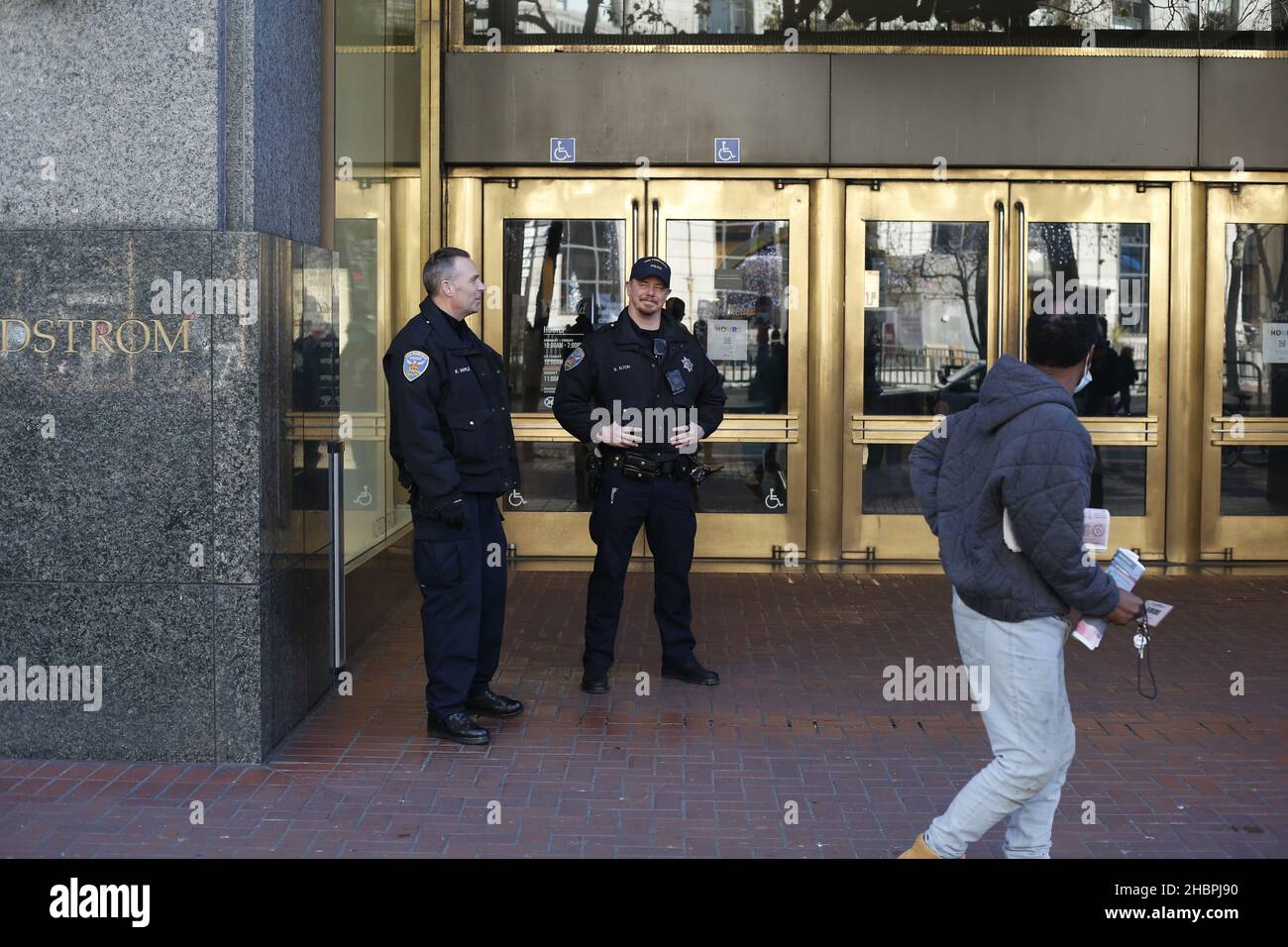Policemen stand outside Macy’s shopping mall.In the recent months, some ...