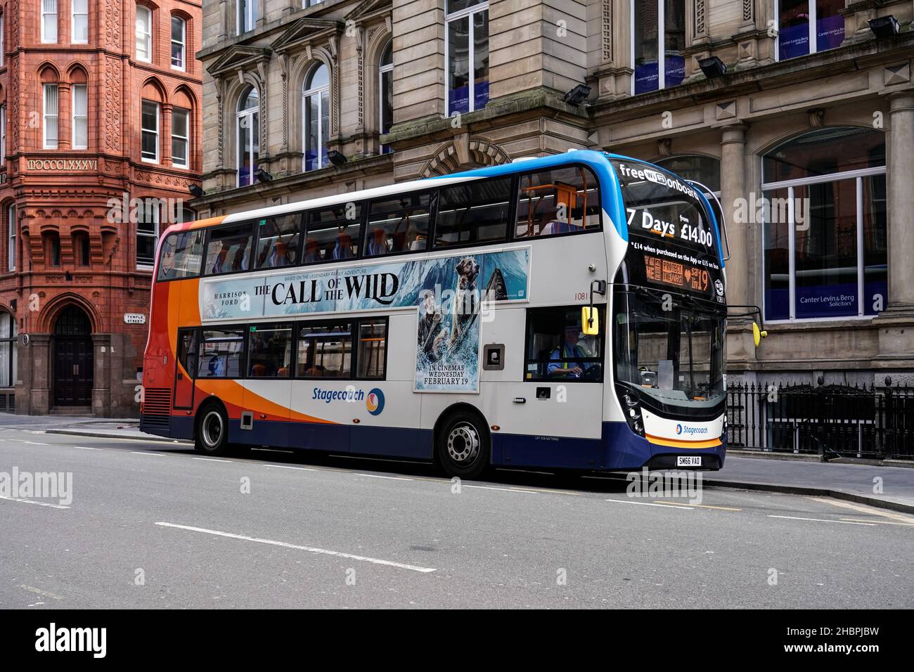 An Arriva bus parked at a bus stop in Liverpool Stock Photo - Alamy