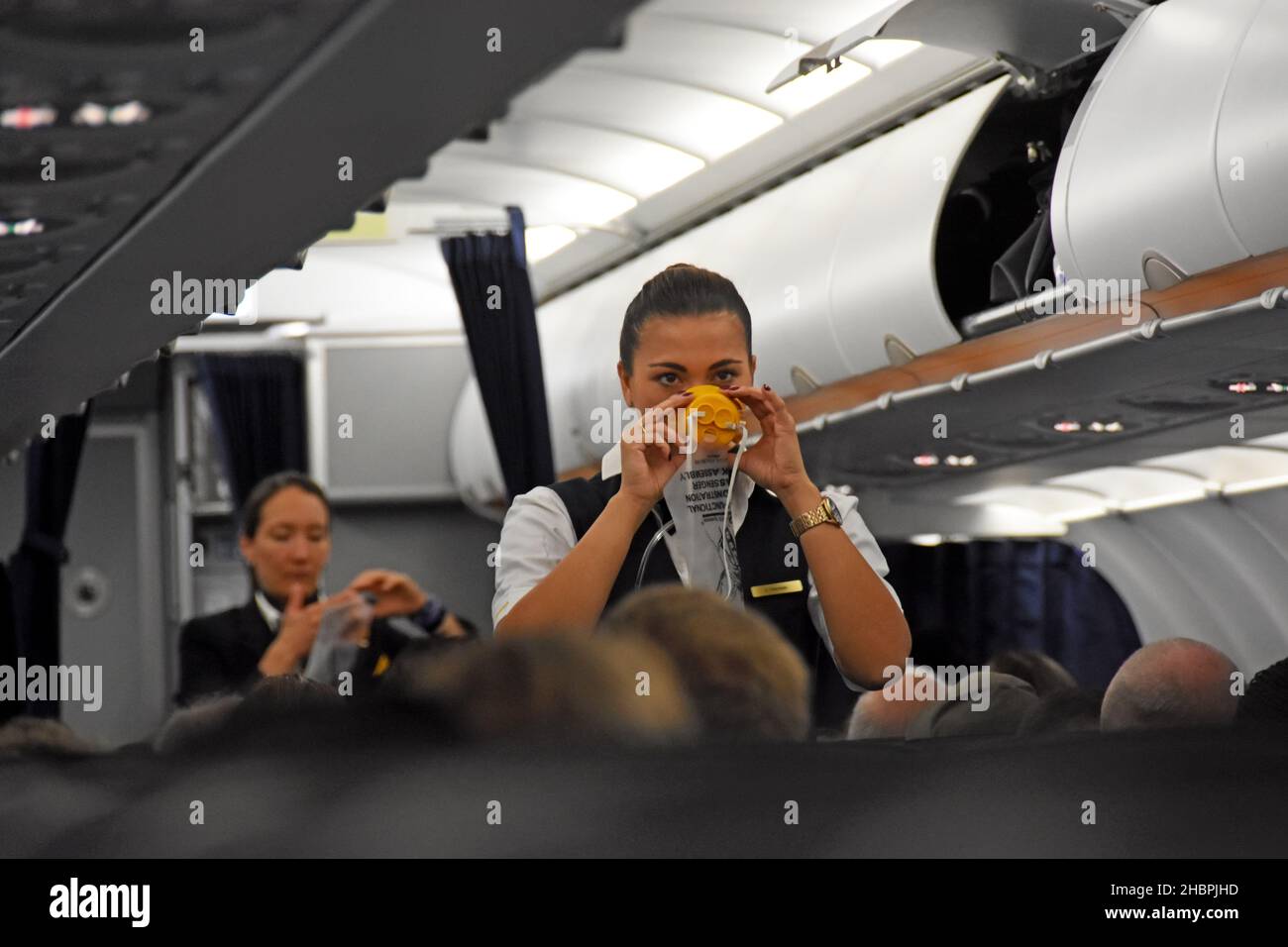 Safety instructions on airplane Stock Photo - Alamy