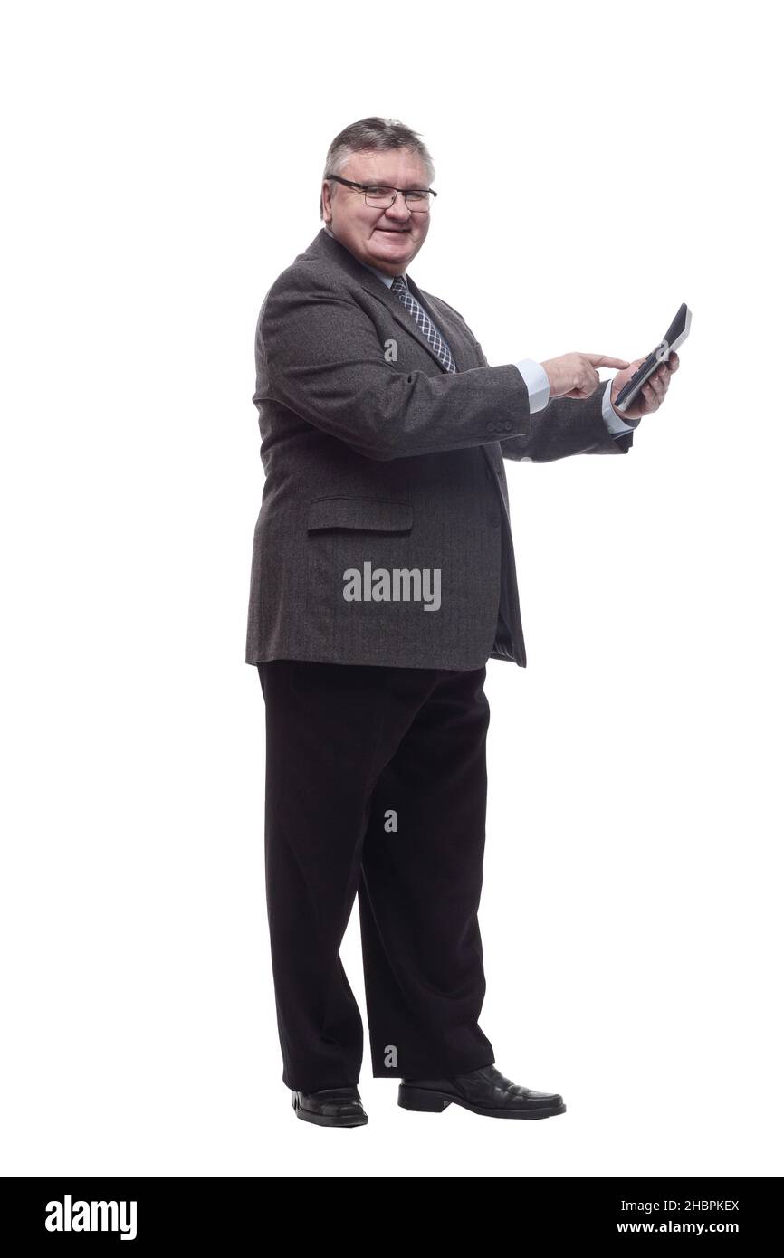 serious business man with a calculator. isolated on a white Stock Photo ...