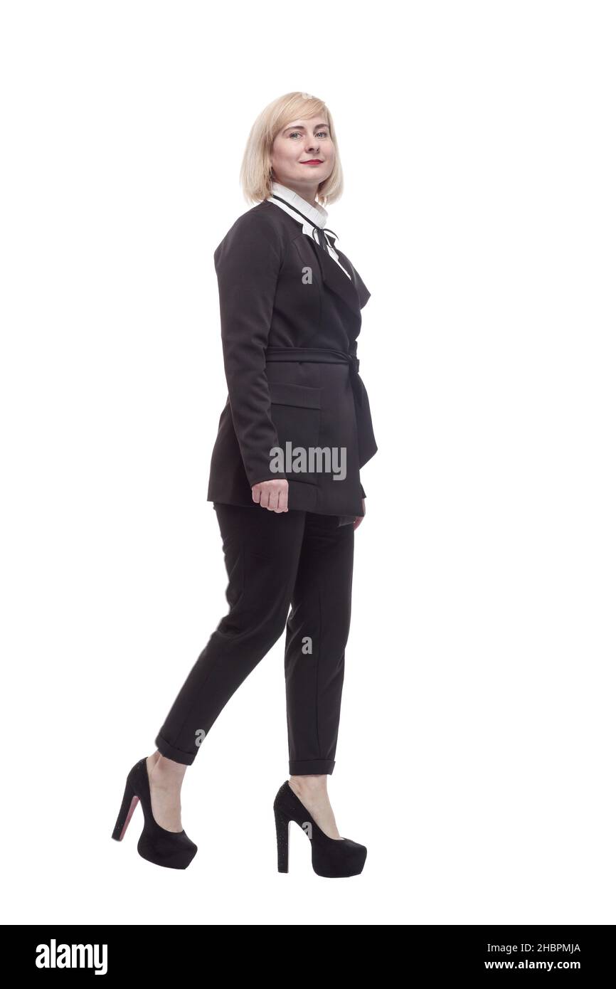 in full growth. confident business woman striding forward Stock Photo ...