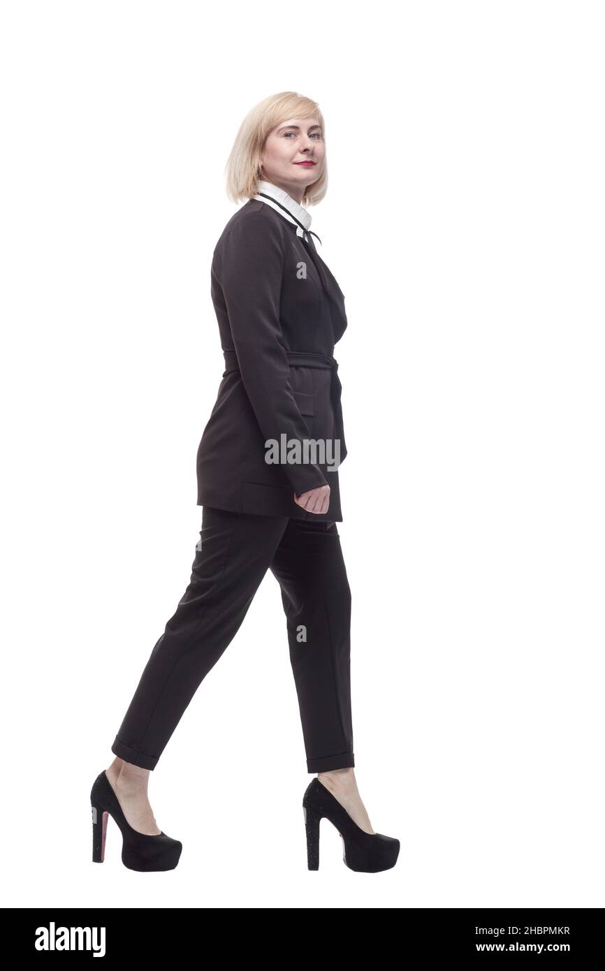 in full growth. confident business woman striding forward Stock Photo ...