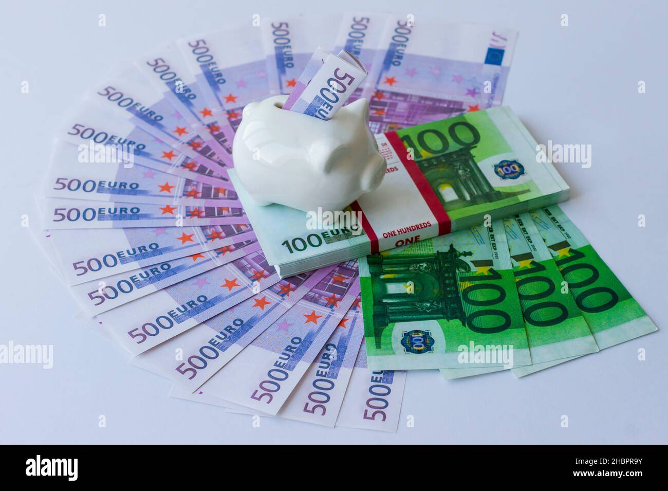many euro and dollar bills are laid out on a purple background with a ...