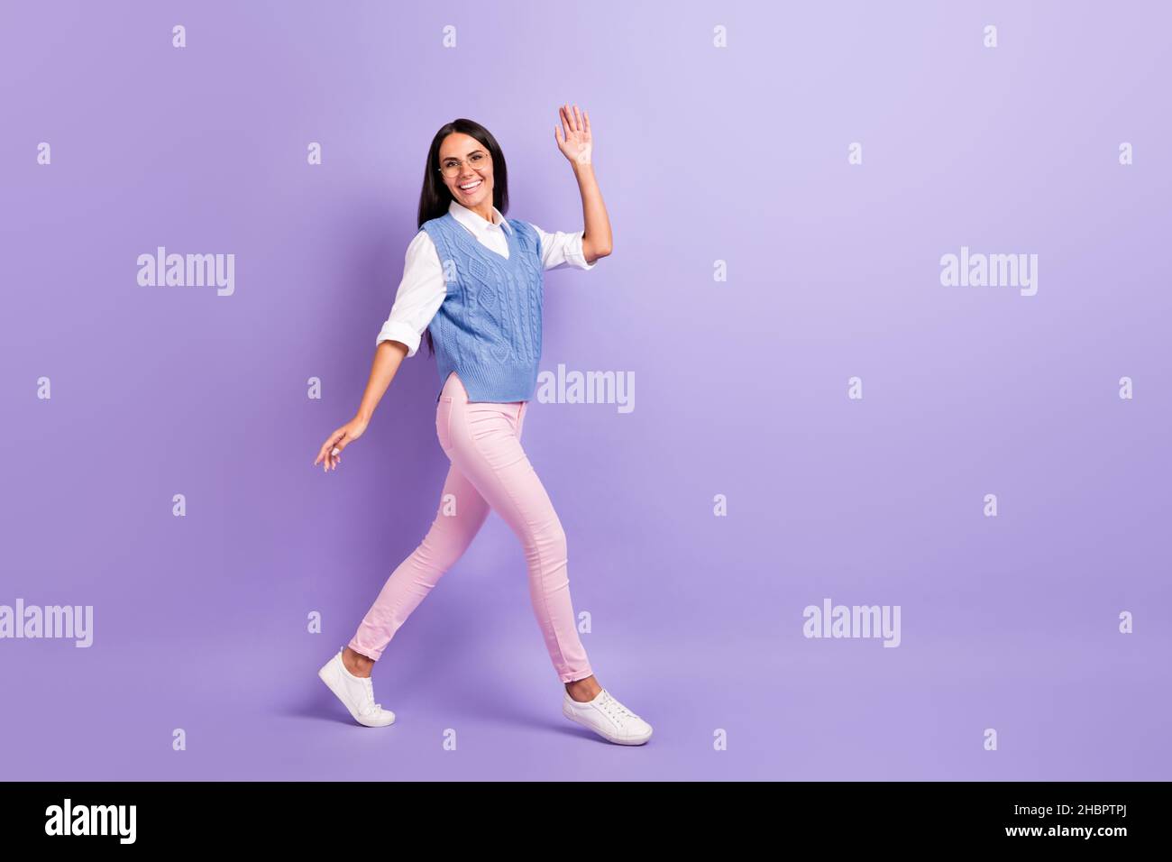 Full length body size view of attractive cheerful friendly girl walking ...